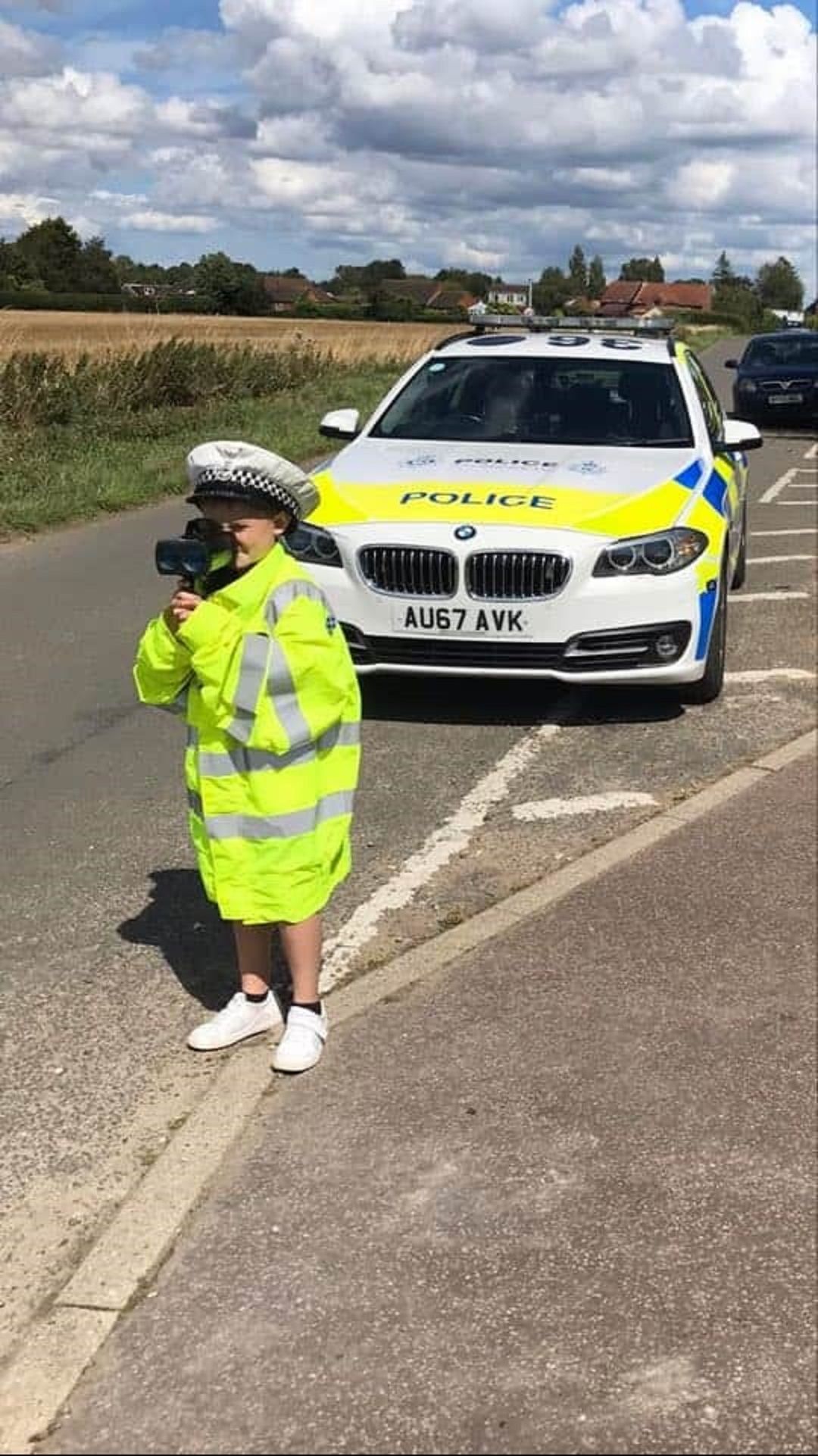 7-Year-Old Boy Gives Speeding Motorists 'Stern Glare': PHOTOS - Comic Sands